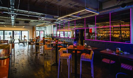 Exhibit B - Premier Construction