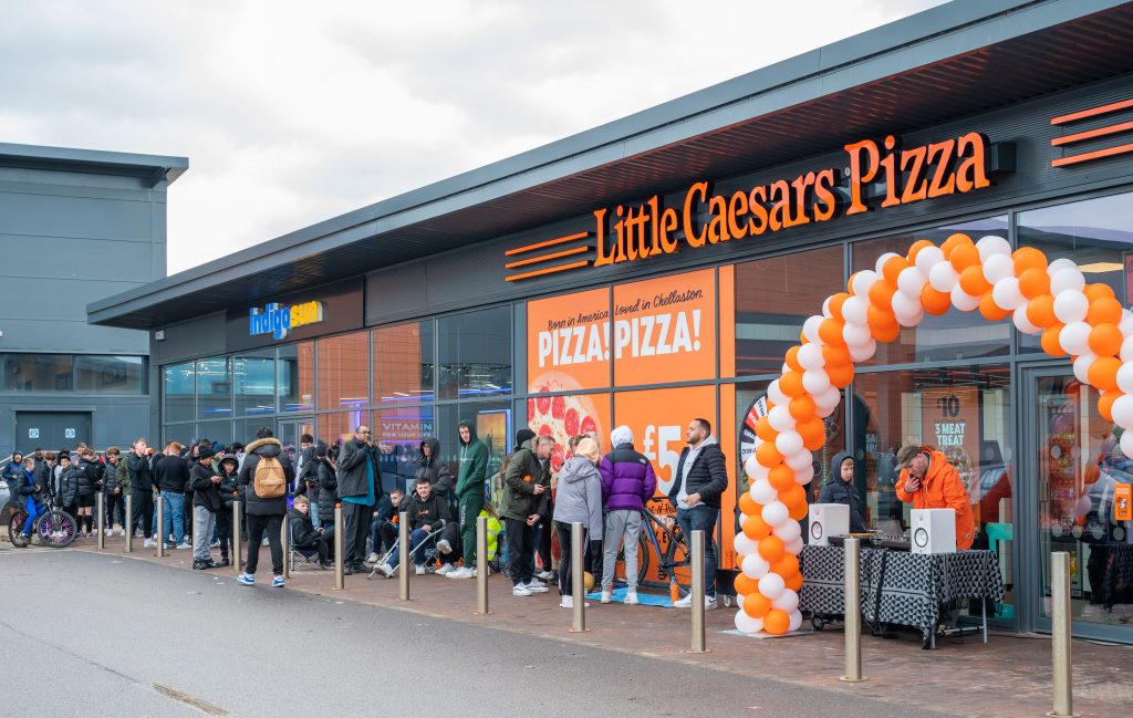 Huge queues formed as people flocked to the first Little Caesars® Pizza ...